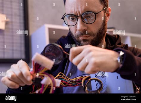 Hand Holding Wires Hi Res Stock Photography And Images Alamy