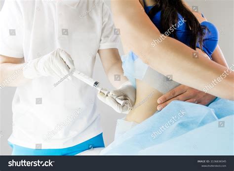 Male Doctor Giving Woman Injection Back Stock Photo Shutterstock