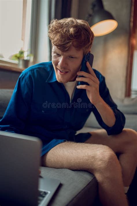 A Young Ginger Man Talking On The Phone And Looking Involved Stock Image Image Of Network