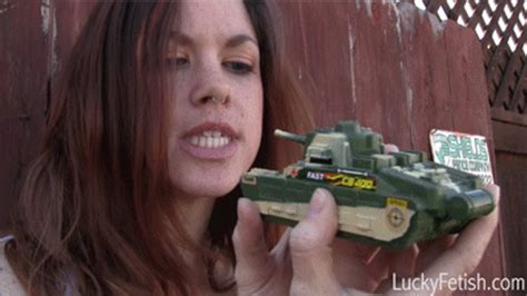 Julie Is Surrounded By Tiny Army Tanks Lucky Fetish Assorted Fetish