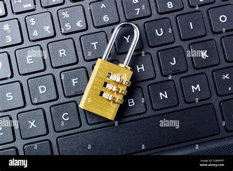 Padlock On Laptop Keyboard Cyber Security Password Concept Stock Photo Alamy