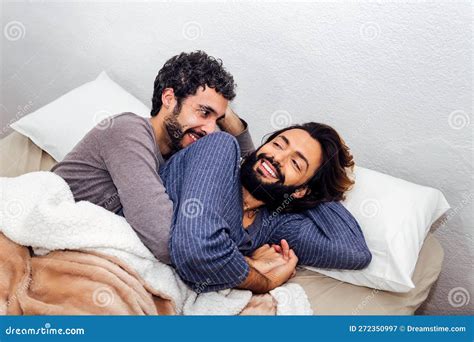 Male Couple Cuddling In Bed Happy In The Morning Stock Image Image Of