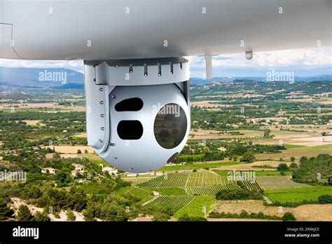 Camera Sensor Pods Under An Unmanned Aerial Surveillance Drone Aircraft