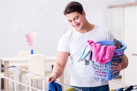 Man Doing Laundry At Home Background And Picture For Free Download Pngtree