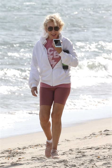 Linda Thompson In A White Track Jacket Was Seen On The Beach In Malibu