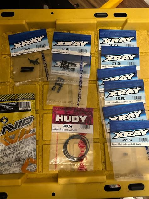 nip 12th scale xray x12 parts lot front springs shock parts body