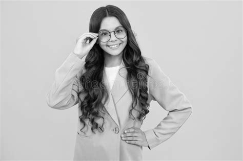 Cute School Girl Wearing Glasses On Yellow Studio Background Smart Clever Schooler Girl In