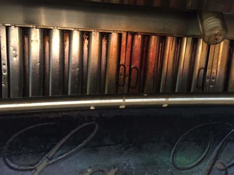 Baffle Cleaning Titan Hood Techs