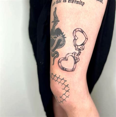 15 Timeless Handcuffs Tattoo Ideas For Unique Expression