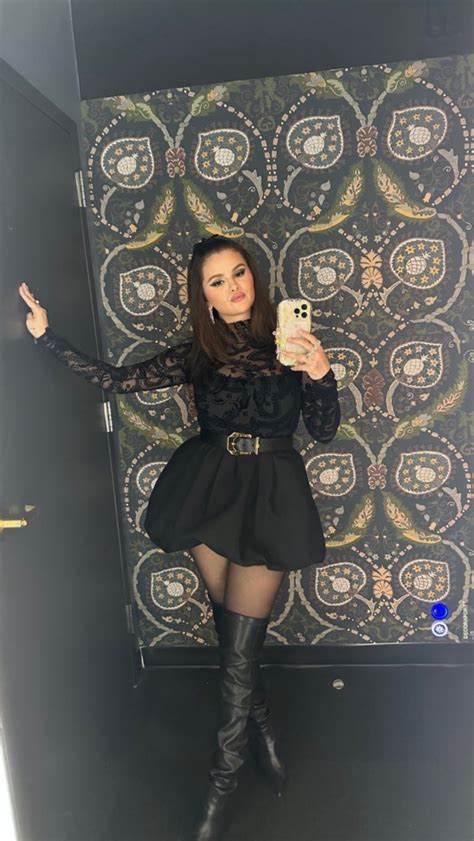 Selena Gomez Shows Off Her Curves In Tight Lace Dress And Knee High
