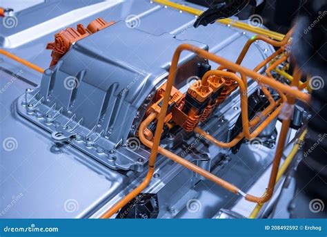 Chassis Of The Electric Car With Powertrain And Power Connections Closeup Blue Toned Ev Car