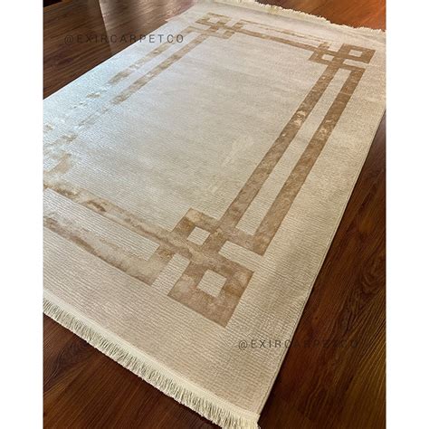 فرش مدرن کرم طرح ورساچه کد ۱۶۸ فرش اکسیر