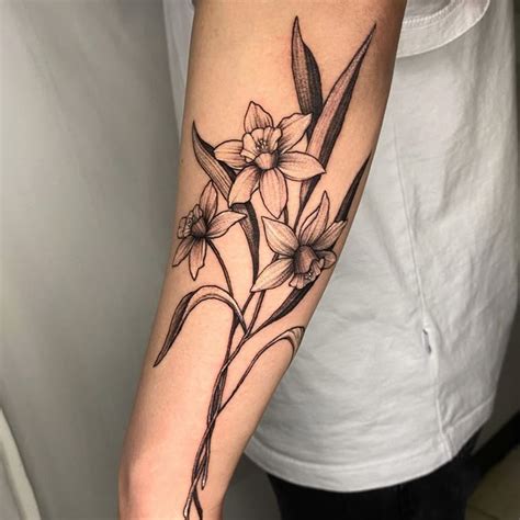 101 Amazing Daffodil Tattoo Designs You Need To See Daffodil Arm