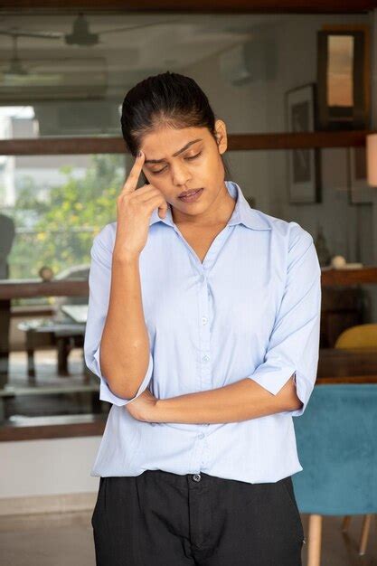 Premium Photo Vertical Shot Of An Annoyed Pretty Asian Girl