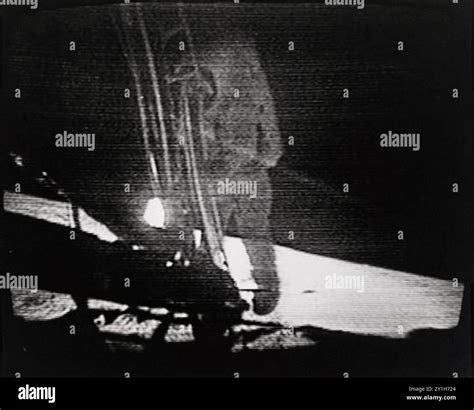 Apollo 11 Astronaut Neil Armstrong Descending The Lunar Module Ladder