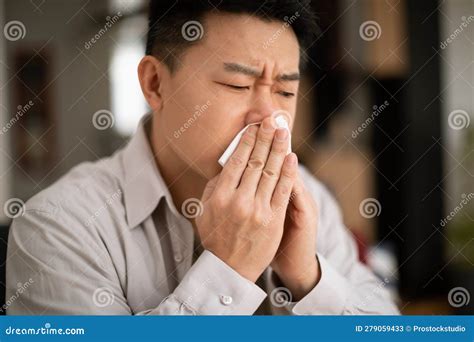 Cold Flu Allergy Concept Sick Middle Aged Asian Man Sneezing In Napkin Ill Male Feeling