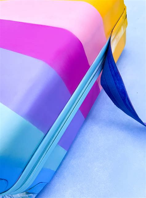 The Rainbow Suitcase Makeover Travel In Style The Way You Want