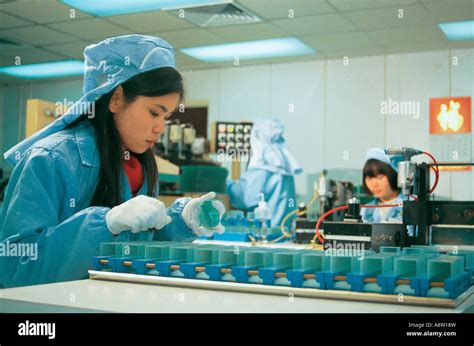 Female Chinese Factory Worker Electrical Goods Assembly Lcd Manufacturing He Yuen China
