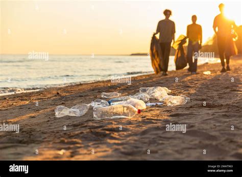 Earth Day Volunteers Activists Team Collects Garbage Cleaning Of Beach Coastal Zone Woman Mans