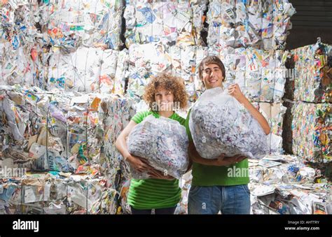 Man And Woman At A Recycling Plant Stock Photo Alamy