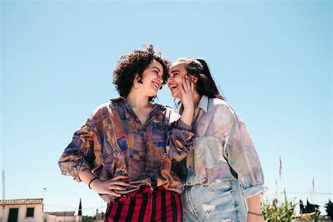 Young Friends Laughing By Stocksy Contributor Lucas Ottone Stocksy