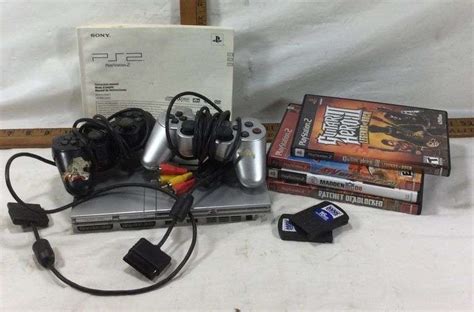 playstation 2 2 controllers 4 games and all power chords