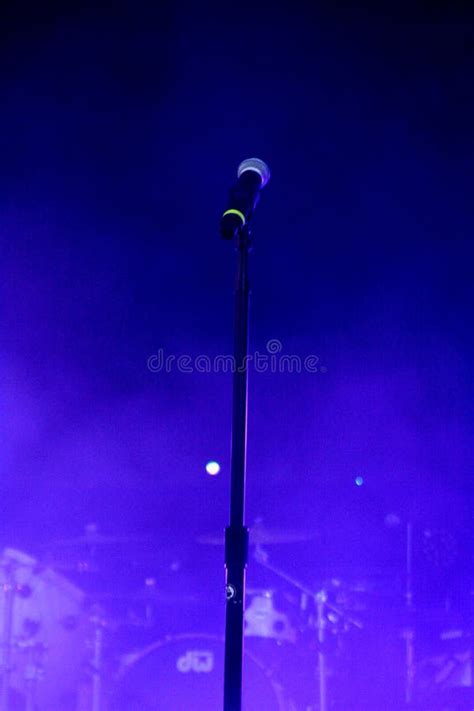 Wireless Microphone On A Stage Bathed In Blue Light Stock Image Image Of Park Audience 281028269