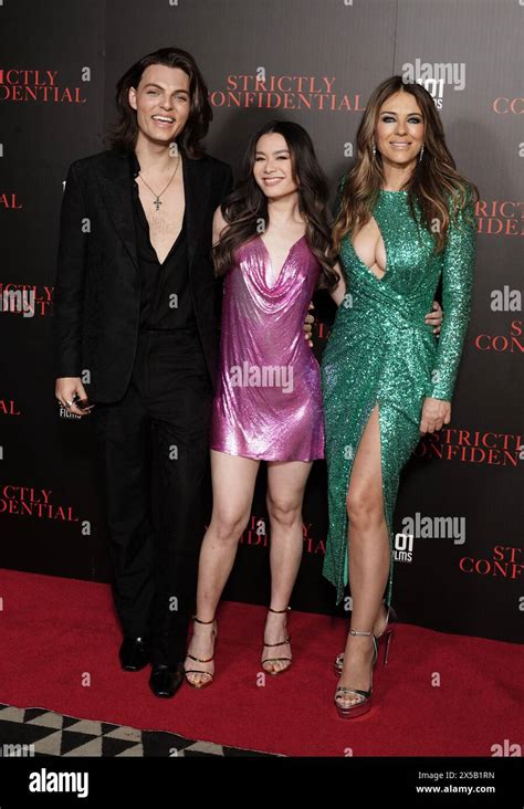 Damian Hurley Pear Chiravara And Elizabeth Hurley Right Arriving For A Special Screening Of