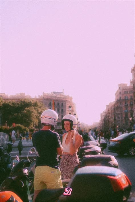 A Man And Woman Wearing Helmets Photo Free Blue Image On Unsplash