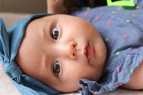 Premium Photo Portrait Of Cute Girl Lying On Bed