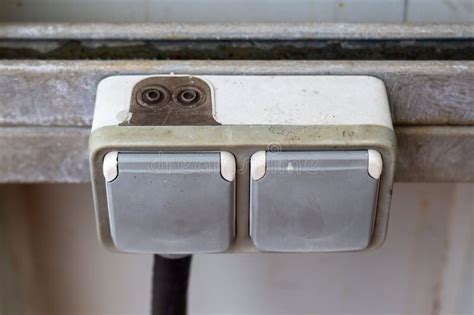 Close Up Of A Weathered Dual Electrical Outlet Stock Image Image Of Burnt Concrete 367120563