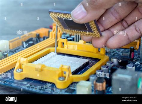 Cpu And Hand Holding Hi Res Stock Photography And Images Alamy