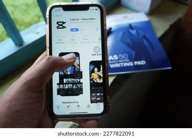 Iphone Scrolling Twitter Photos And Images Pictures Shutterstock