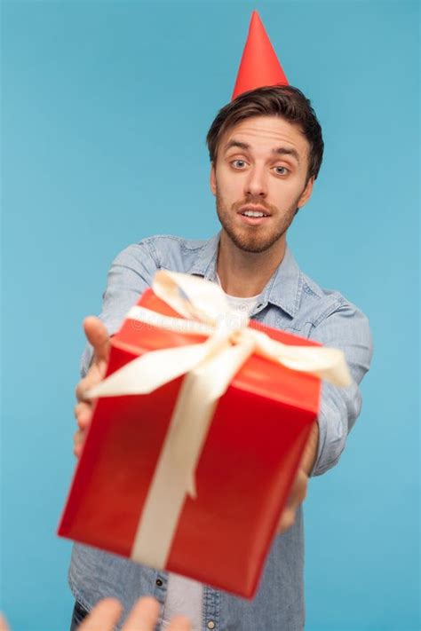 Pov Hand Giving Wrapped Blue T To Surprised Teenager Girl Looking At