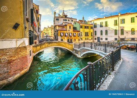 Venice Cityscape Buildings Water Canal And Double Bridge Italy Stock