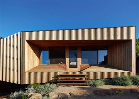 Split House By Bkk Architects Is Made Up Of Angular Wooden Structures