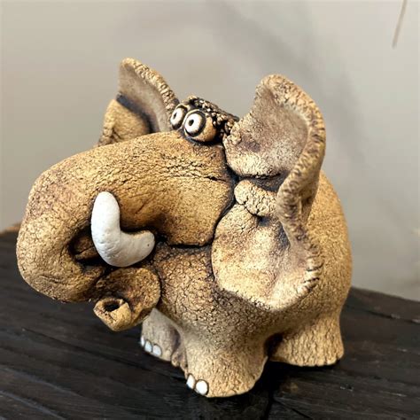 Whimsical Ceramic Elephant Sculpture — Handmade Art Piece