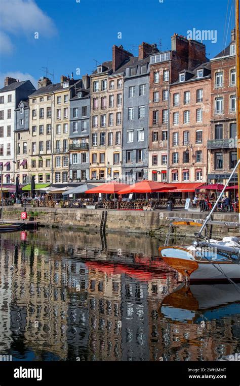 The Old Harbour Lined With Restaurants In Honfleur Normandy France