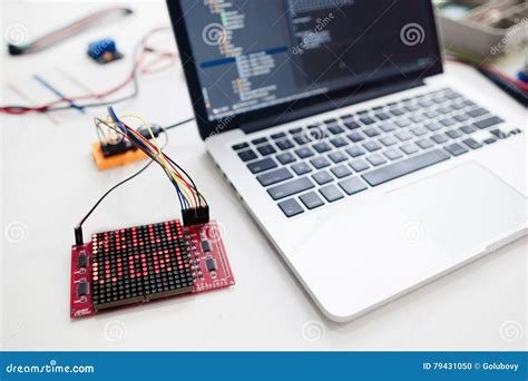 Led Dot Matrix Display Is Connected To A Micro Controller Using Jumper Wires That Contains