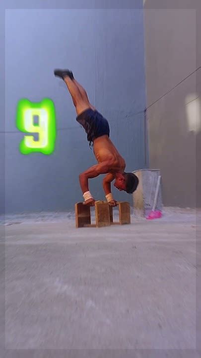 Slow handstand pushup? how slow can you do a handstand pushup???#gymnast #calisthenics #bktsuman ...