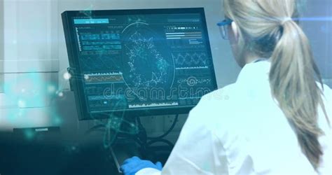 Image Of Data Processing Over Caucasian Female Scientist Using Computer In Laboratory Stock