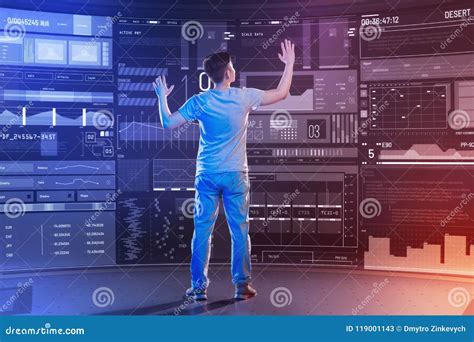 Serious Software Developer Putting His Hands Up While Working In A Modern Office Stock Image