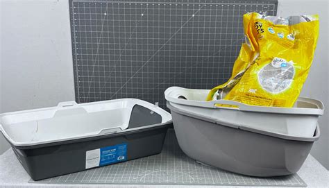 2 Kitty Liter Boxes With A Scoop And Liter