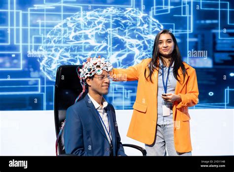 Smiling Neuroscientists Talking At Ai Convention Sharing Neural Implants Industry Insights To