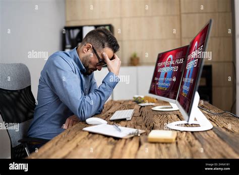 ransomware cyber attack showing personal files encrypted screen stock