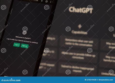 openai chat gpt on mobile phone and computer in background editorial
