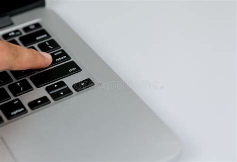 finger pressing return key on keyboard stock image image of