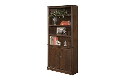 Hamlyn Large Door Bookcase In Medium Brown By Ashley At Gardner White
