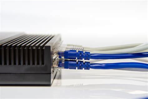 Premium Photo Network Switch And Ethernet Cables Close Up Utp Cables Connected To A Patch