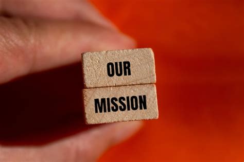Premium Photo Our Mission Message Written On Wooden Blocks With Orange Background Conceptual